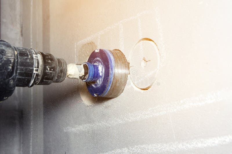 Man with Cordless Hand Drill Drilling a Hole in Concrete Stock Image ...