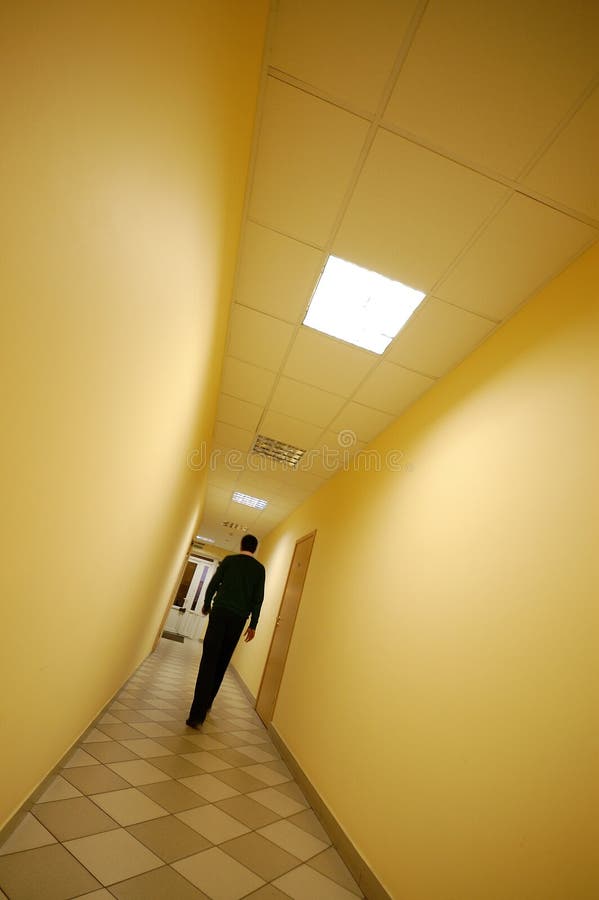 Man in corridor stock photo. Image of wall, light, walk - 11968644