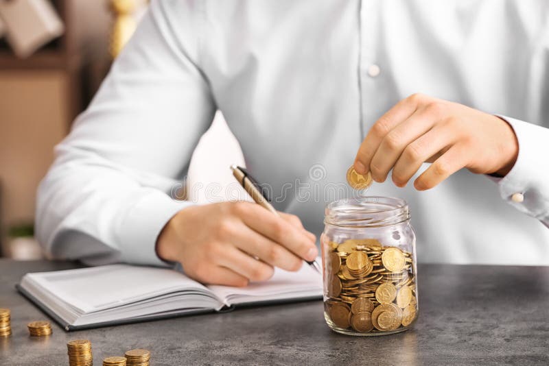 Man Counting Coins at Table. Savings Concept Stock Photo - Image of ...