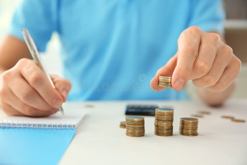Man Counting Coins at Table. Savings Concept Stock Image - Image of ...