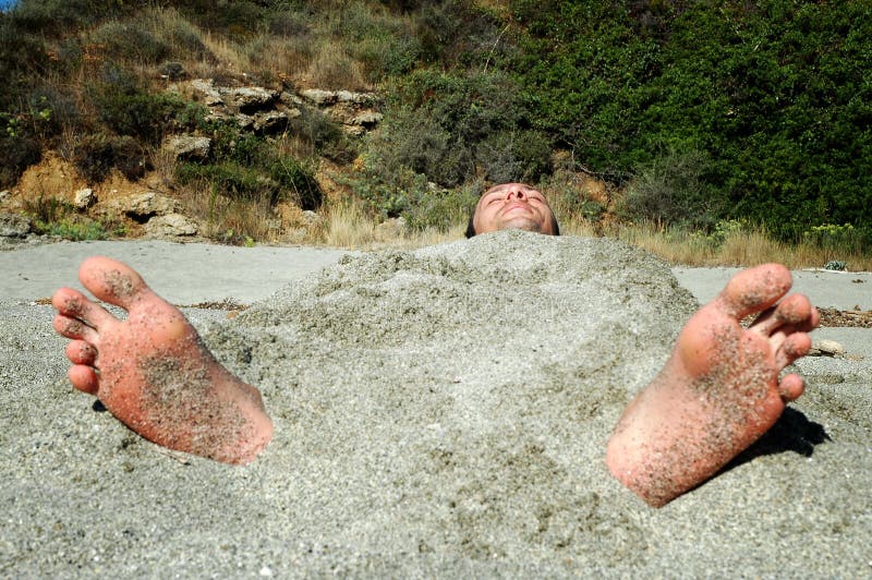 Man Covered By Sand On The Beach Stock Image - Image of ocean ...