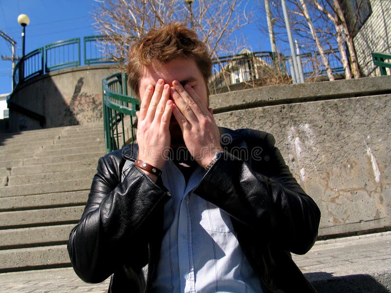 Man Covering Face stock photo. Image of face, newfoundland - 2954