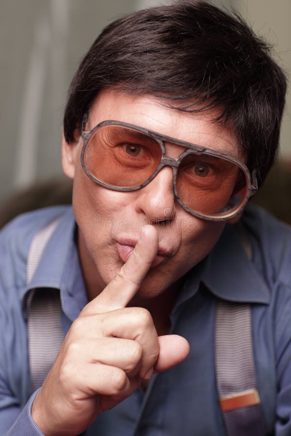 Man Covering His Lips with His Finger Stock Photo - Image of retro ...