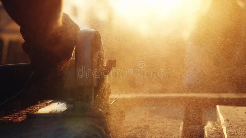 Man is Craft Working at a Work Bench with Power Tools in Slowmotion ...