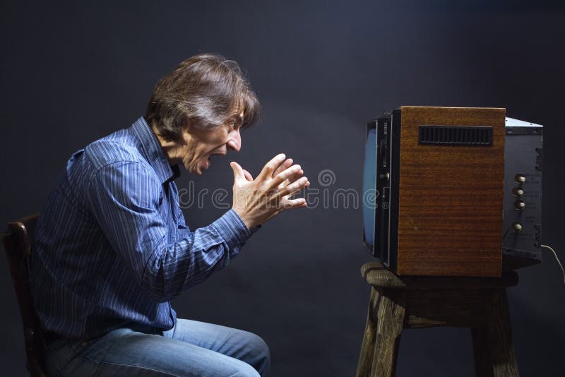 A Man Cries while Watching TV. Stock Image - Image of indoor, leisure ...