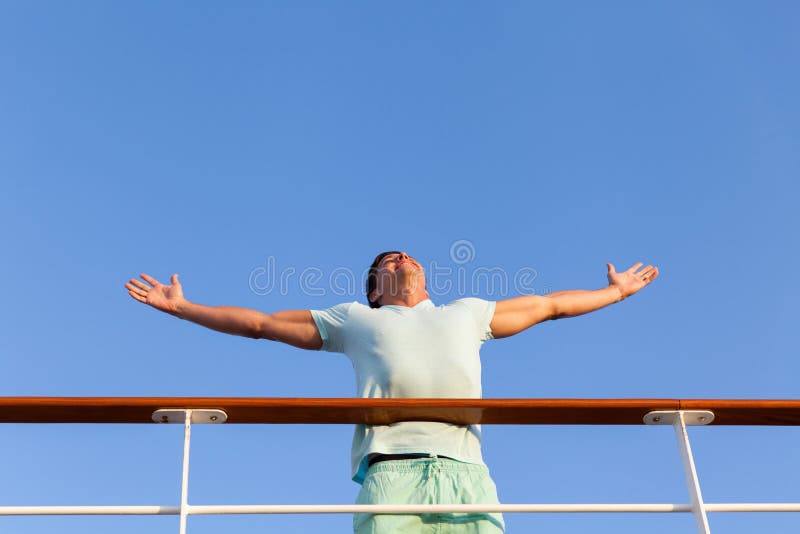 Muscular Young Man Leaning on Hand-railing on Cruise Ship Stock Image ...