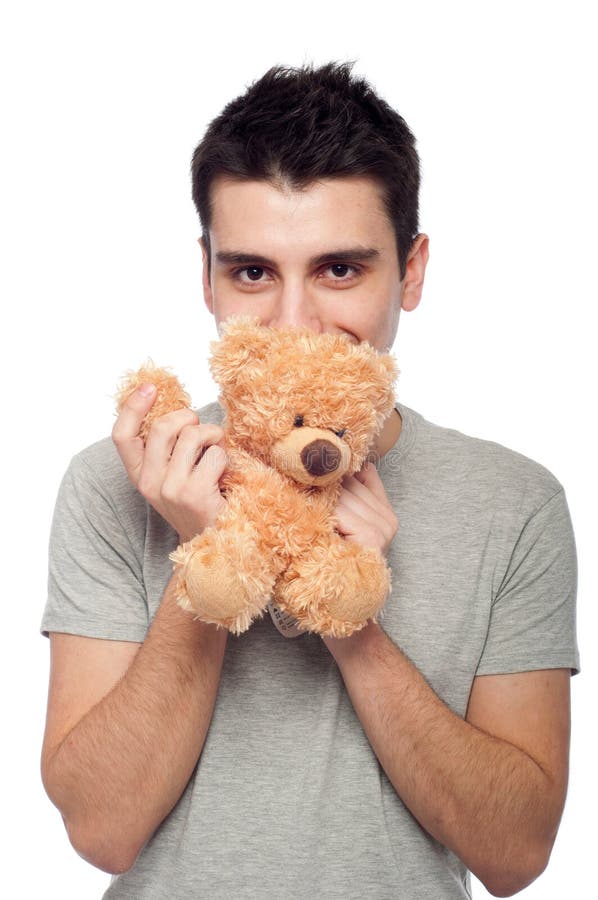 Man cuddling teddy bear stock image. Image of adult, affection - 18400995