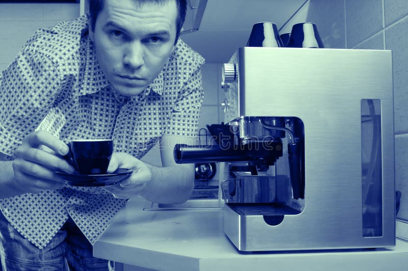 Man with cup of esresso. stock photo. Image of espresso - 13313142