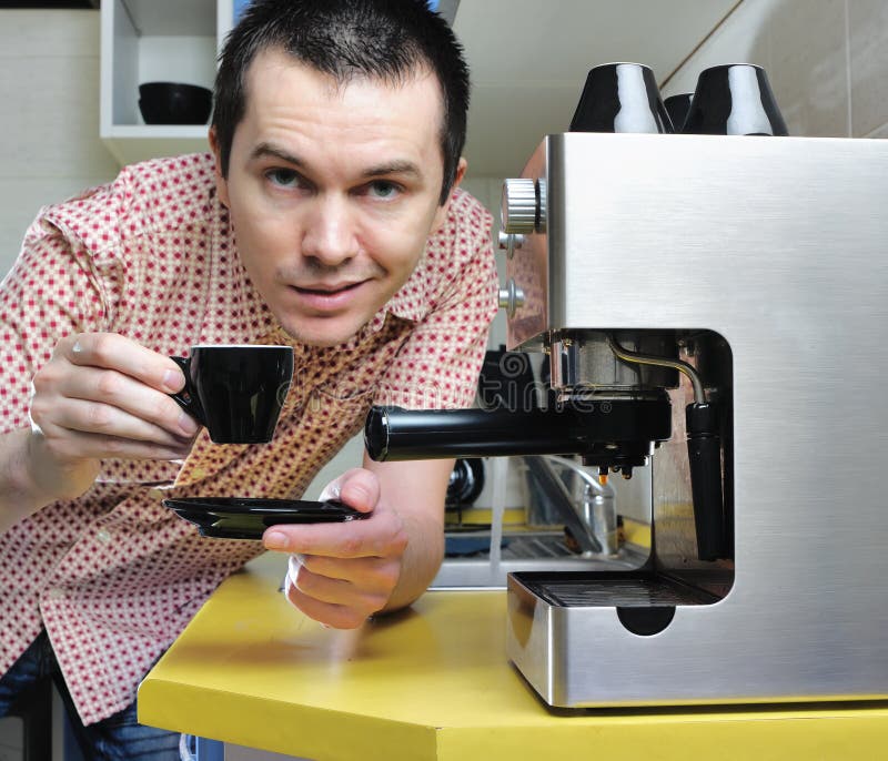 Man with cup of esresso. stock photo. Image of espresso - 13313142