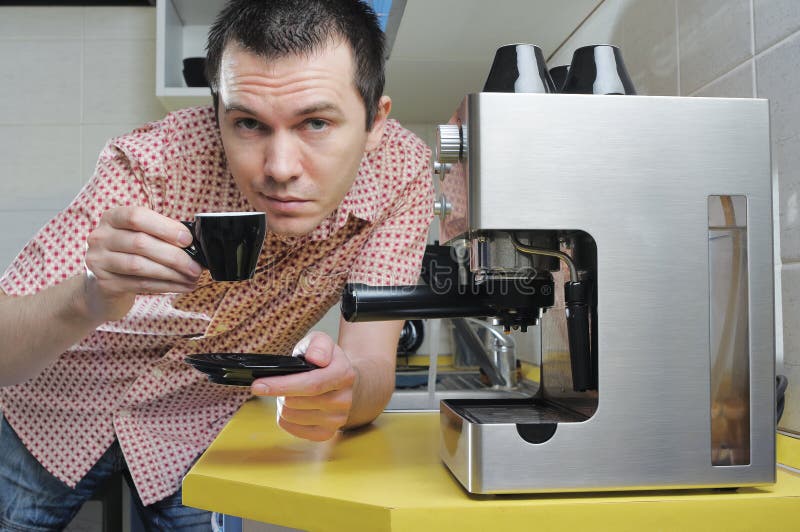Man with cup of esresso. stock photo. Image of hand, blue - 13313176