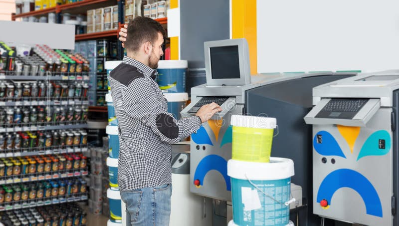 Man Customer Using Technical Computer in Paint Shop Stock Photo - Image ...