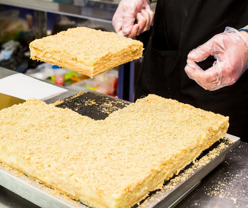 A Man Cut the Cake Napoleon Pastry Stock Photo - Image of cream ...