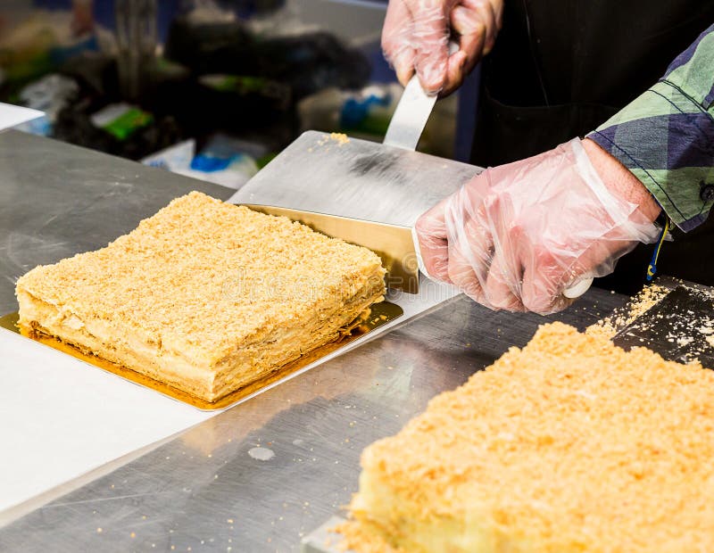 A Man Cut the Cake Napoleon Pastry Stock Photo - Image of food, paper ...