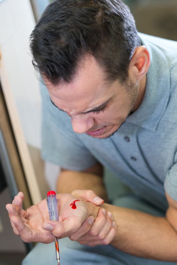 Man with cut on hand stock photo. Image of fear, finger - 260339830