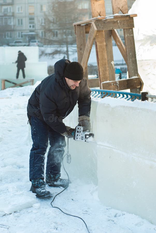 A man cut ice slab stock image. Image of male, work, asphalt - 22427239