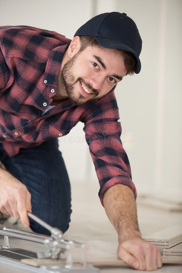 Man Cut Tile Using Tile Cutter Tool Stock Image - Image of cement ...