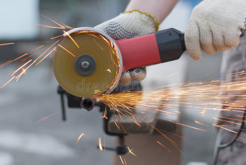 Man cuts metal. stock image. Image of manufacturing, industry - 41636439