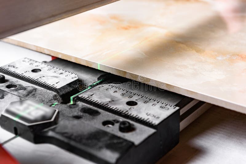 Man Cutting Ceramic Tile with Manual Tile Cutter. Stock Image - Image ...