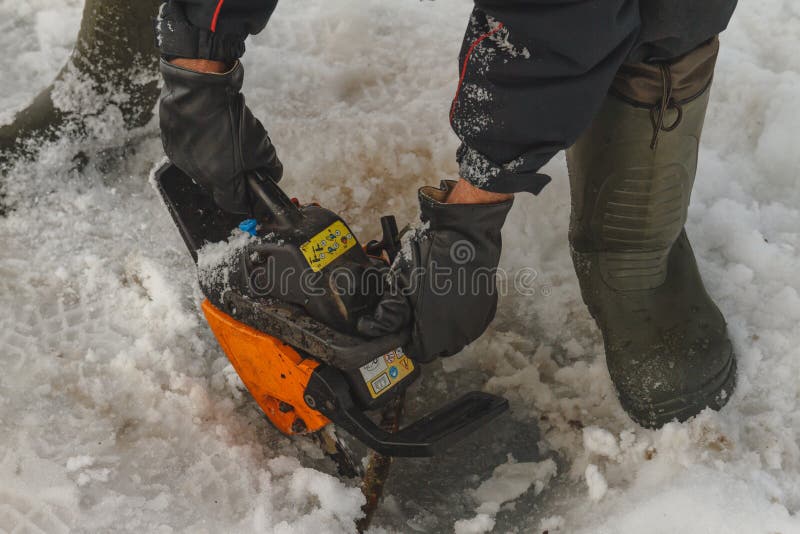 Man Cutting Chainsaw Shell in Ice Stock Image - Image of leisure ...