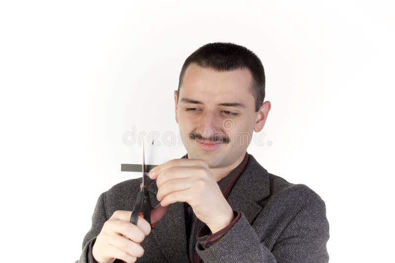 Man cutting a credit card stock photo. Image of crisis - 12332554