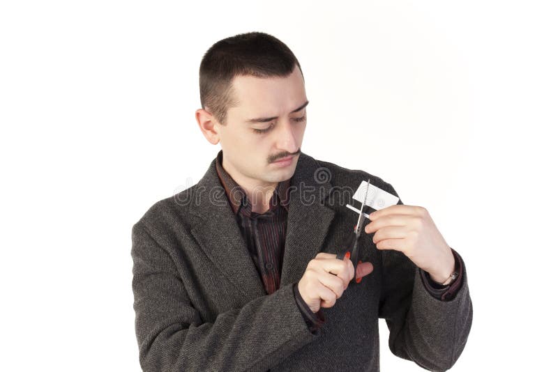 Man cutting a credit card stock image. Image of happy - 12332561