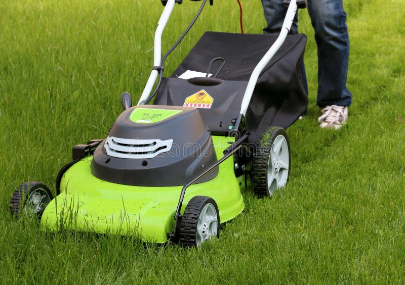 Man Cutting the Grass with Lawn Mower Stock Image - Image of garden ...