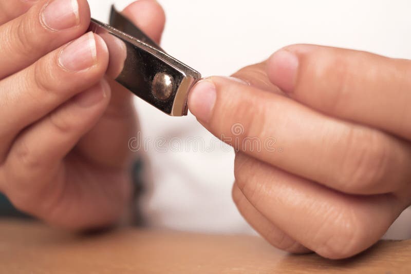 Man Cutting His Fingernail Using Nail Clipper Stock Photo - Image of ...