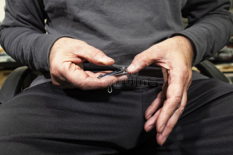 Man Cutting Nails Using a Nail Clipper Stock Image - Image of beauty ...
