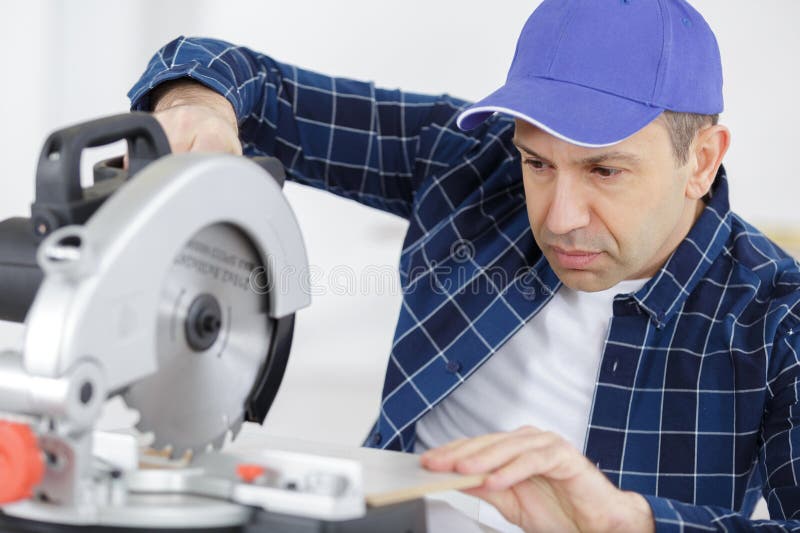 Man Cutting Metal with Circular Saw Stock Photo - Image of mechanic ...