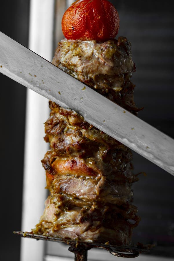 Man cutting prepared meat stock image. Image of chicken - 266400925