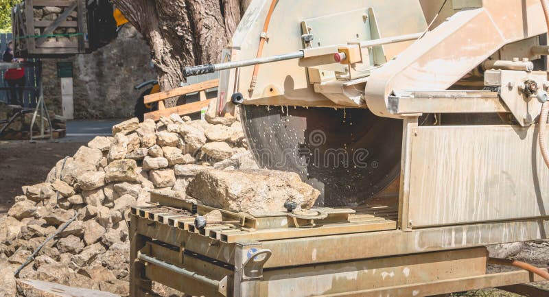 Man Cutting a Stone with a Water Saw Stock Photo - Image of detail ...