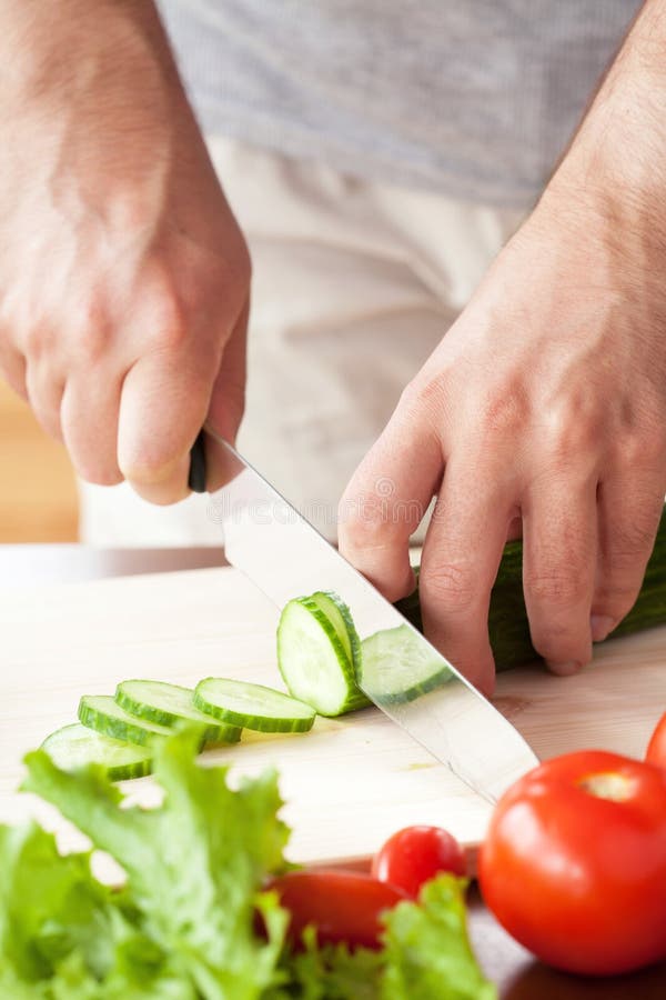 Man Cutting Vegetables for Salad Stock Photo - Image of slicing, tomato ...