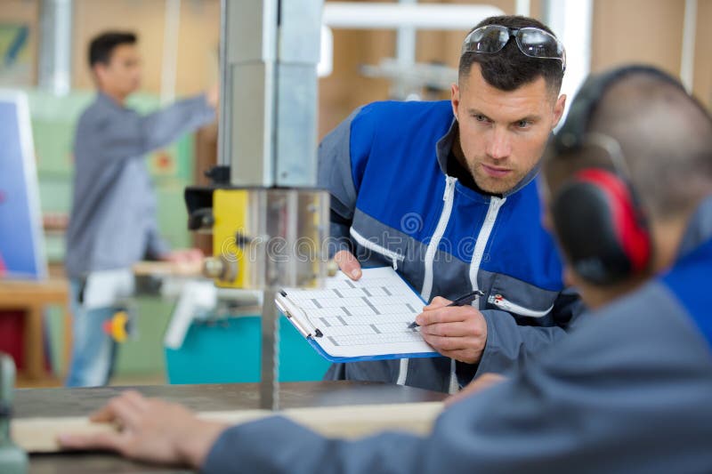 Man Cutting Wood with Band Saw Stock Photo - Image of profession, black ...