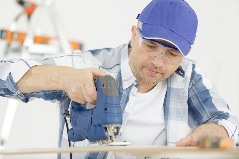 Man Cutting Wood with Milling Machines Closedup Stock Photo - Image of ...