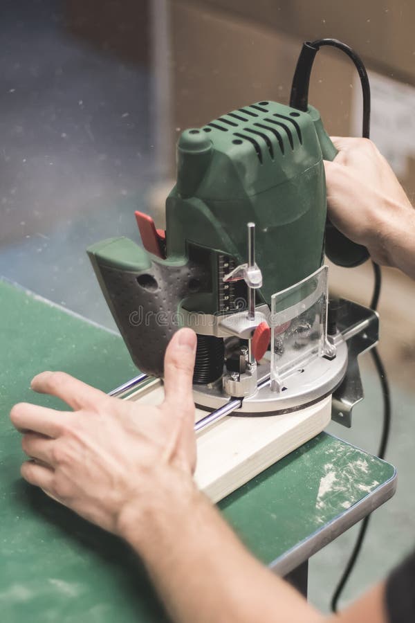 Man Cutting Wood with a Milling Machines Stock Photo - Image of ...
