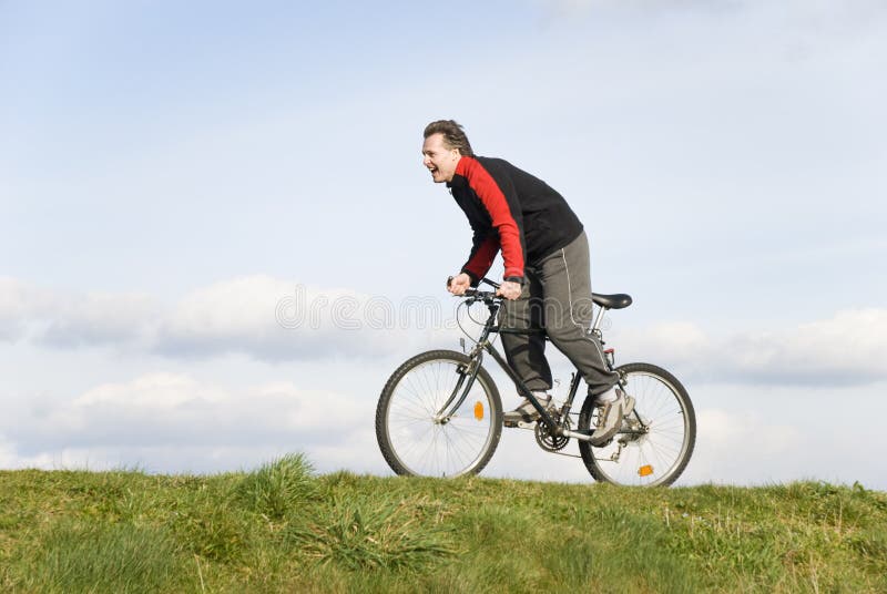 Man cycling stock photo. Image of tracksuit, sport, handsome - 12225040