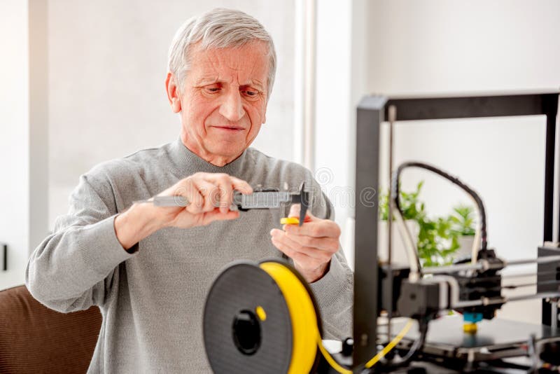 Man with 3D printer stock image. Image of printing, detail - 217092789