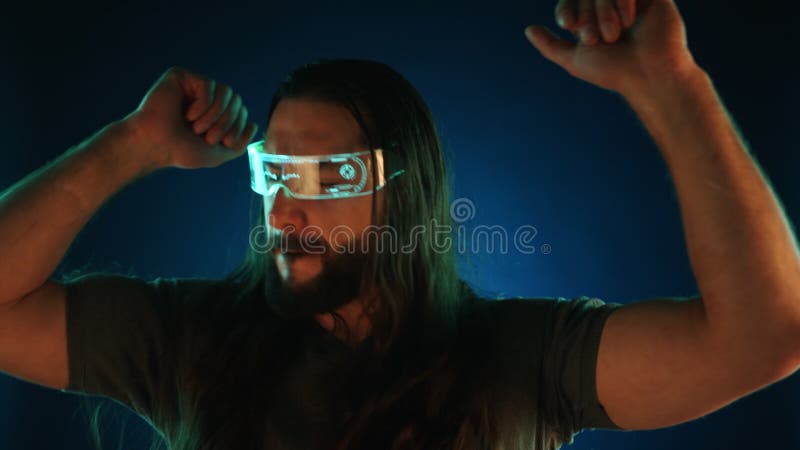 Man Dancing in Neon Light Expressing Freedom and Energy Stock Video ...