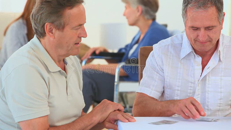 Man dealing cards stock video. Video of play, elderly - 39934745