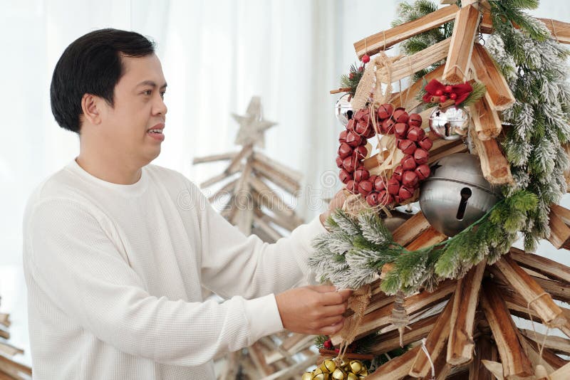 Man Decorating Christmas Tree Stock Photo - Image of craft ...