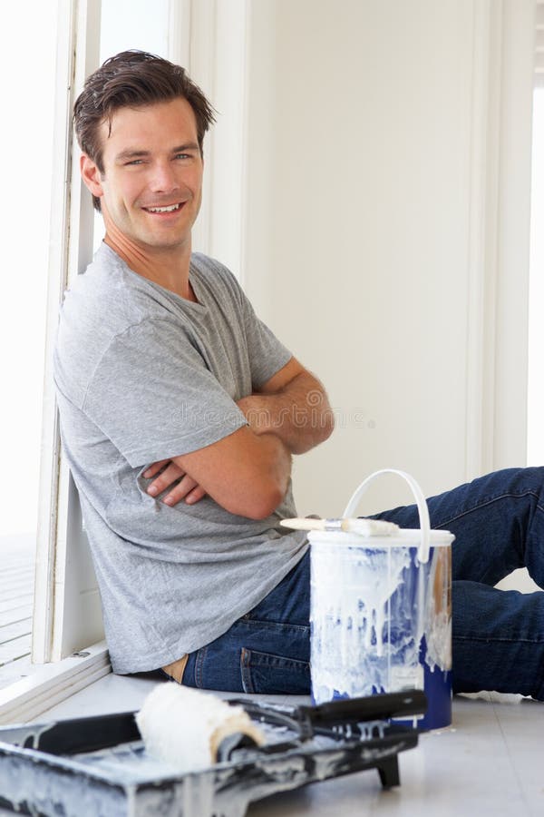 Man decorating house stock photo. Image of adult, door - 21044940