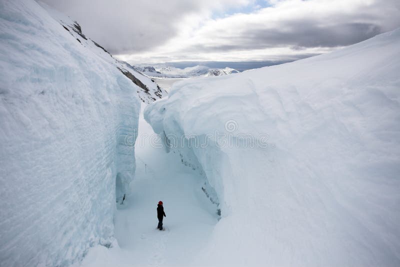 Man in the Deep Glacier Crevasse - Arctic Stock Photo - Image of ...