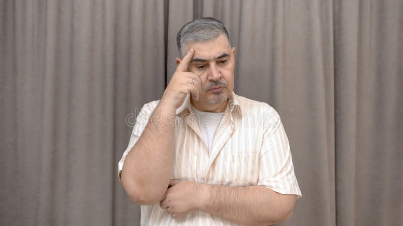 A Man Deep in Thought. Reflections, Decision Making, Doubts Stock Photo ...