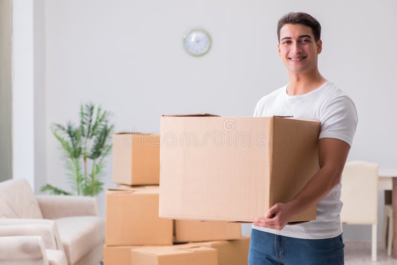 The Man Delivering Heavy Boxes at Home Stock Photo - Image of movers ...
