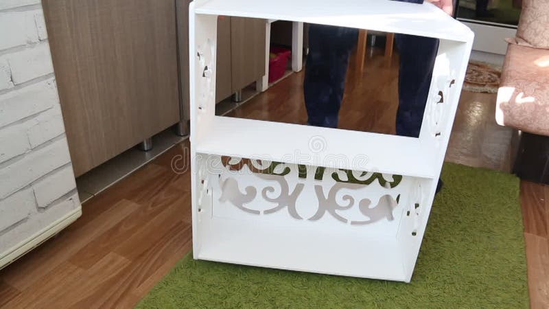 A Man Demonstrates an Assembled Plywood Computer Desk. Shows it from ...