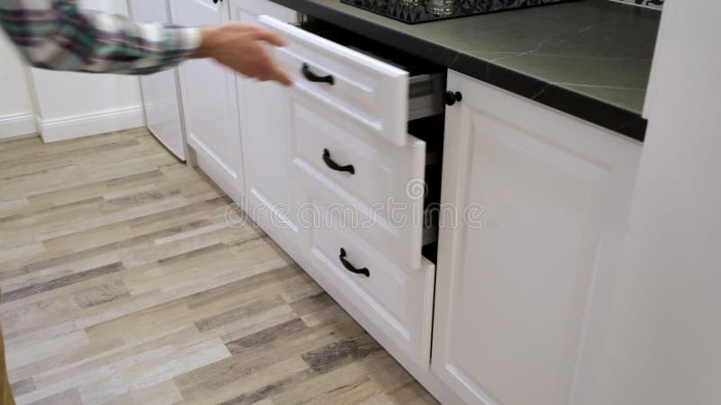 Man Demonstrating Soft Closing Kitchen Drawers Stock Footage - Video of ...