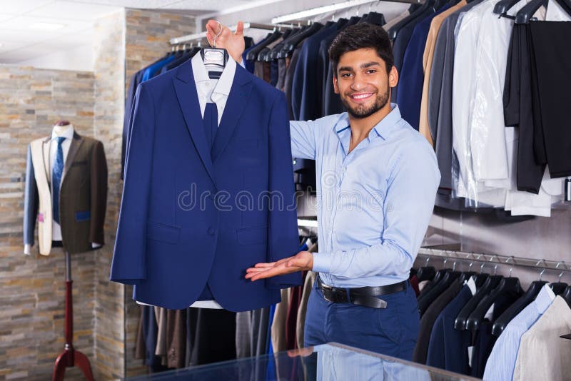 Man Demonstrating Suit in Shop Stock Image - Image of fabric, shopping ...