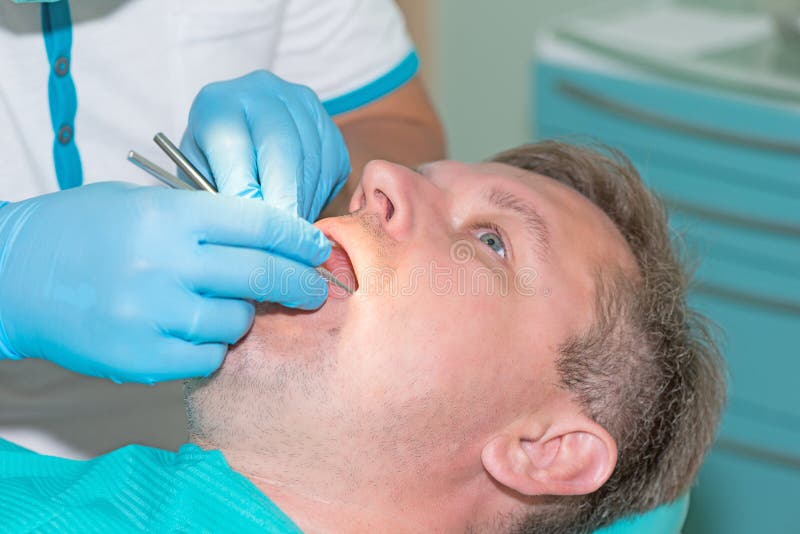 Man in Dentist Office Doing Annual Check Up Stock Image - Image of ...