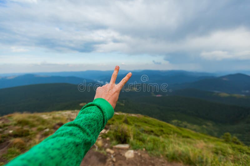 Man Descend Down a Large Green Mountain Range Stock Image - Image of ...