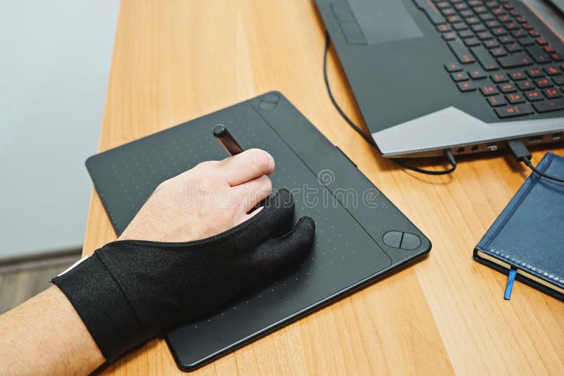 Above View of Man Hand Designer Use Graphics Tablet with Touch Screen ...